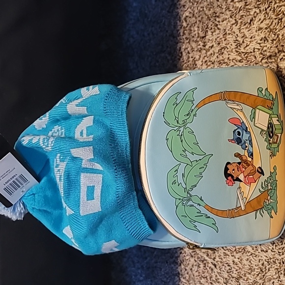 Loungefly | Bags | Lilo And Stitch Hammock Loungefly Mini Backpack With A Stitch Ohana Knit Pom ...